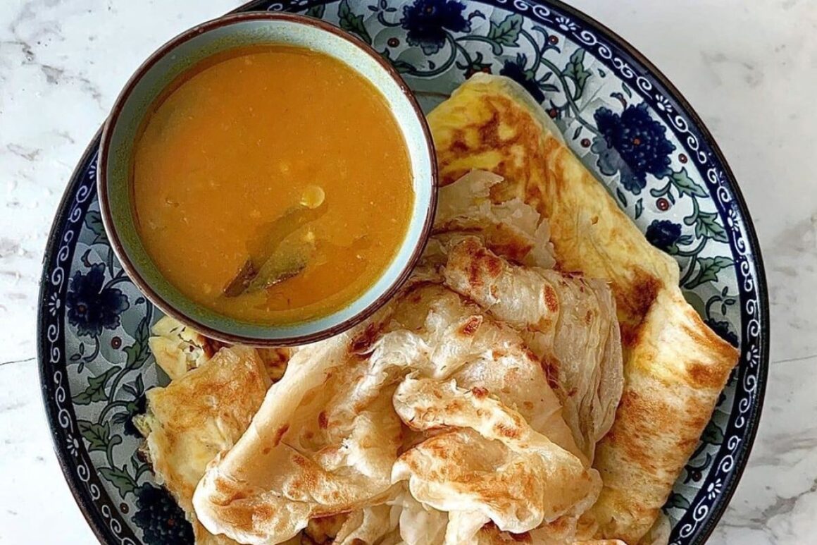 Roti Canai: A Guide to Malaysia's Beloved Flatbread - | TheTravelShots